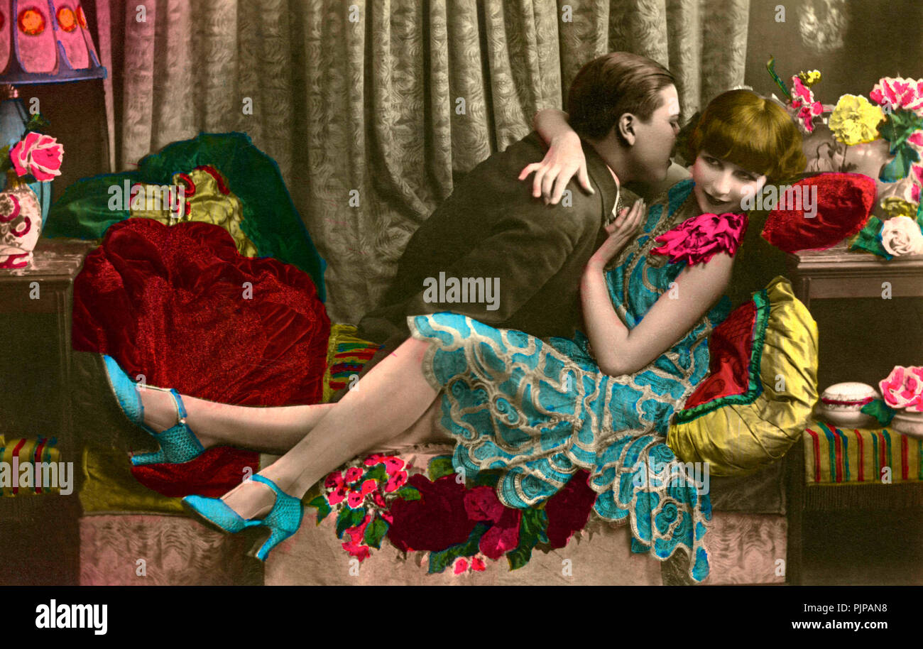 He whispers in her ear hi-res stock photography and images - Alamy