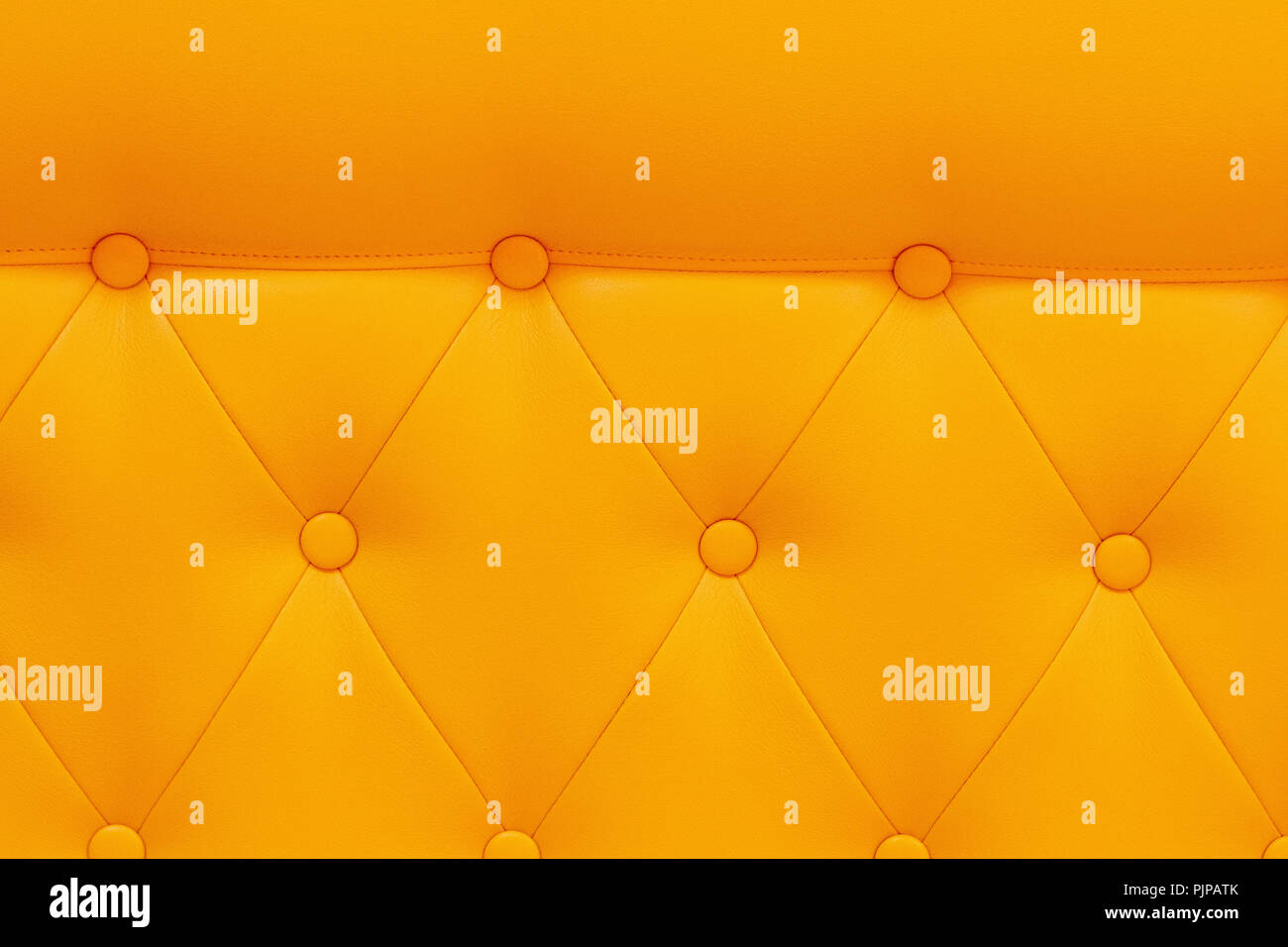 Elegant saturated glossy yellow leather texture of sofa chair Stock ...