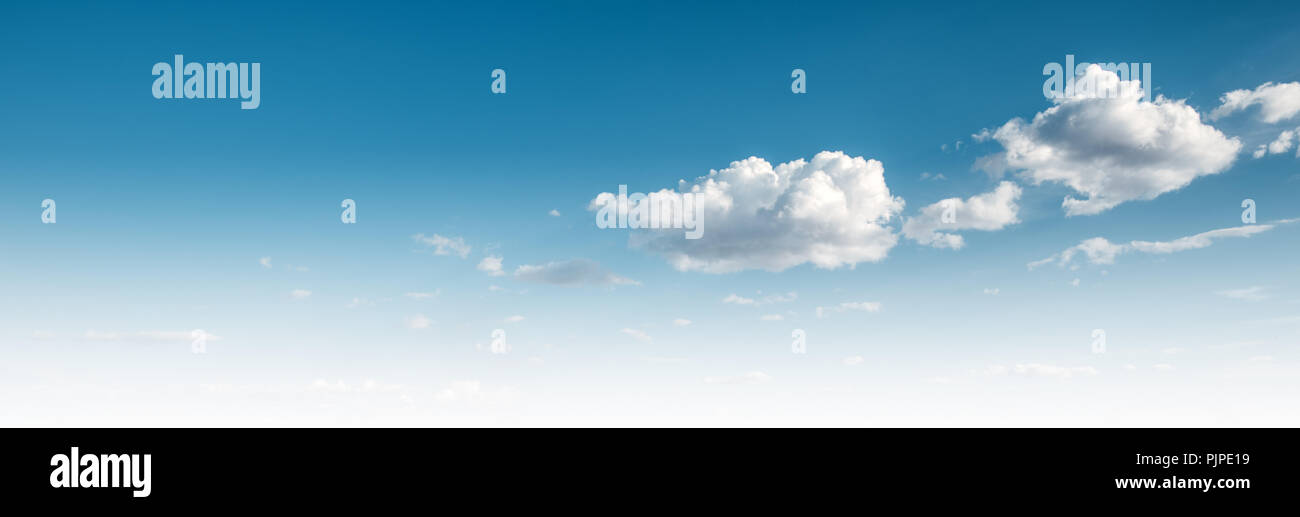 Clear blue sky and white clouds summer background Stock Photo - Alamy