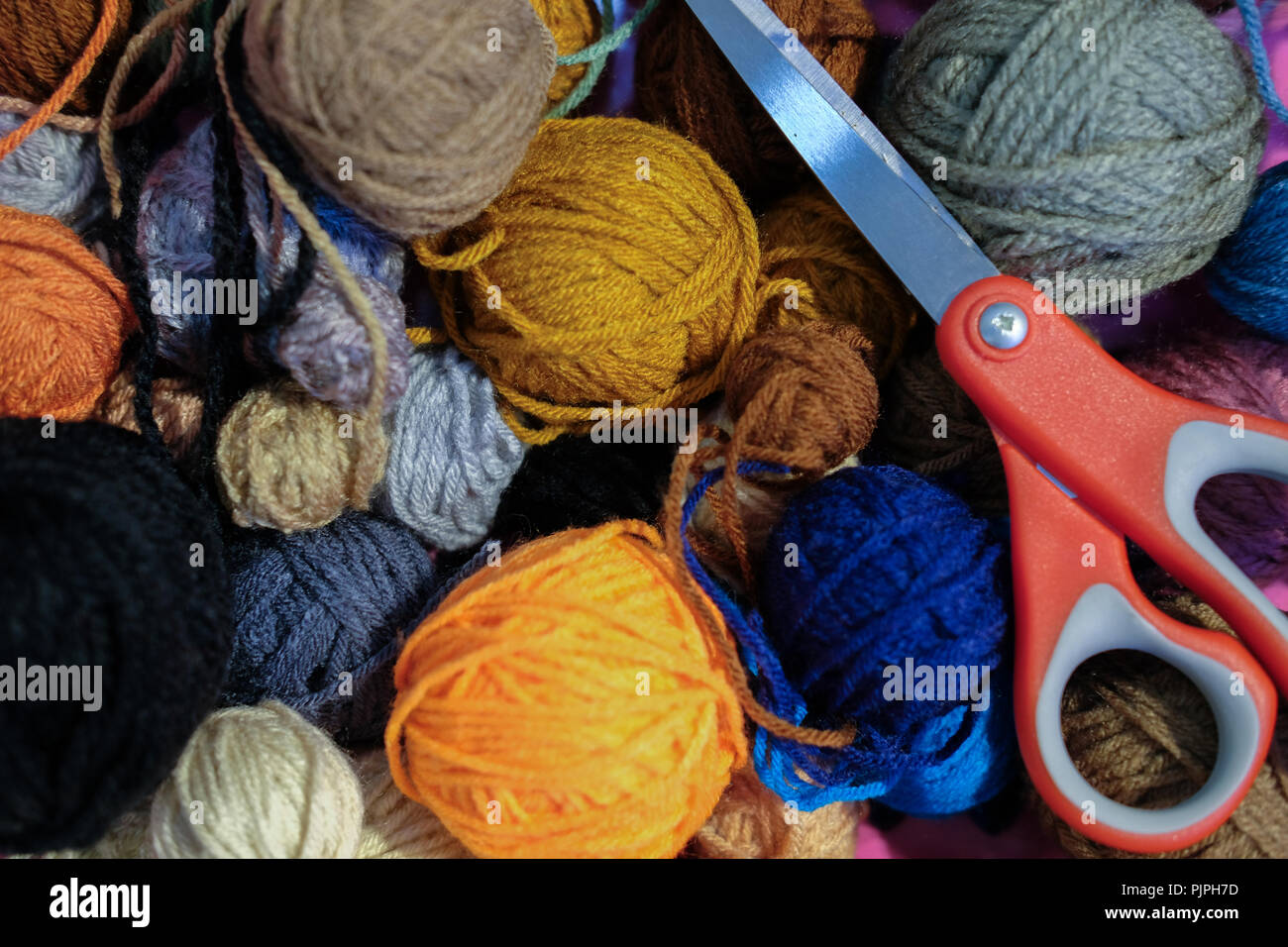 colorful knitting yarn ball, scissors. handmade handicraft embroidery ...