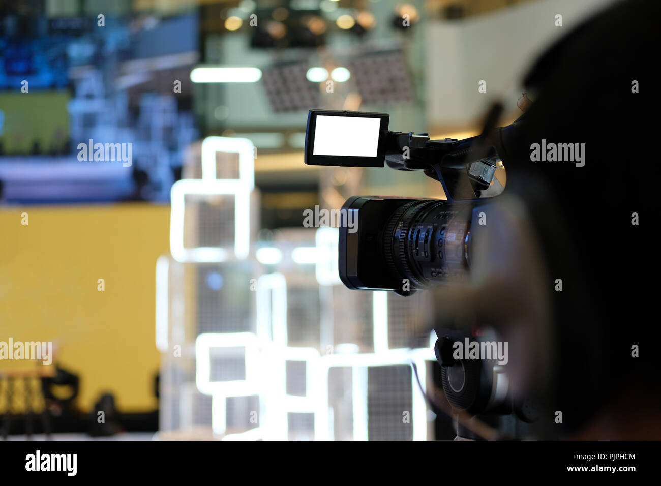 professional video production camera recording live event on stage ...