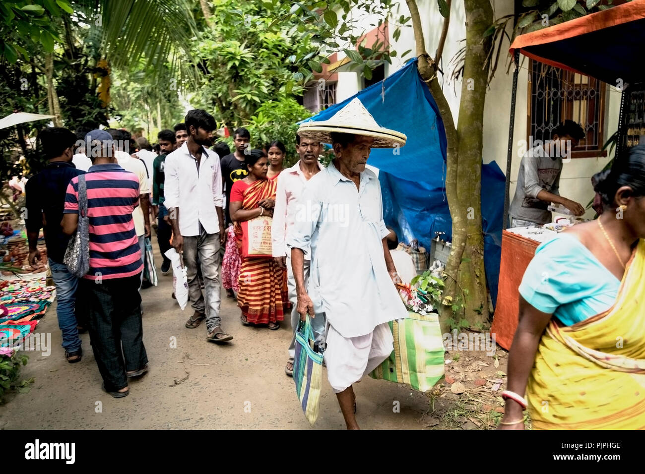 Village,people,aged,young,join,mass fair ground ,Goddess Manasa,Rural ...