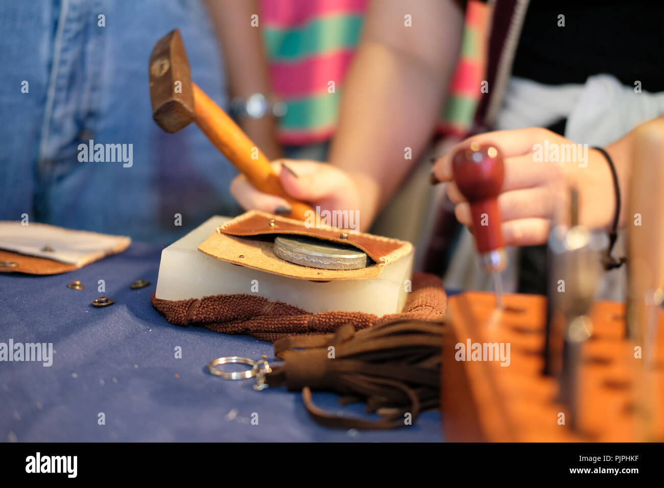 craftsman making leather bag. handmade DIY handicraft workshop Stock ...