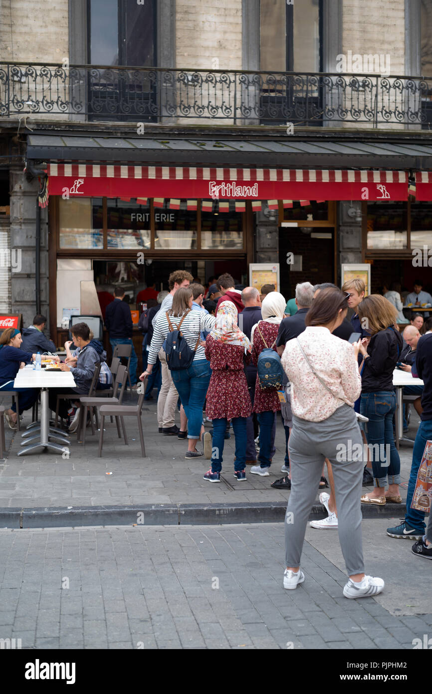 Waiting in line Stock Photo - Alamy