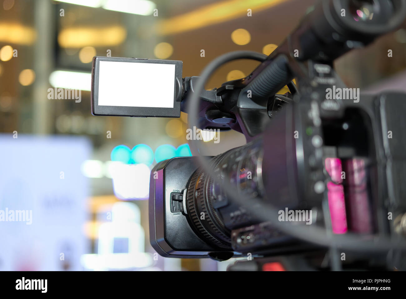 professional video production camera recording live event on stage ...