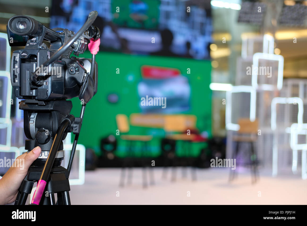 professional video production camera recording live event on stage ...