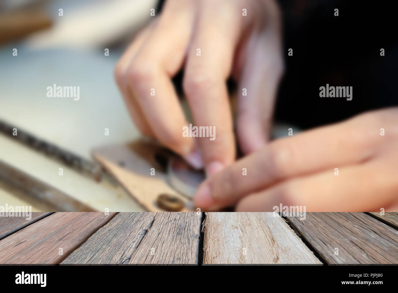 craftsman making leather bag. handmade DIY handicraft workshop Stock ...