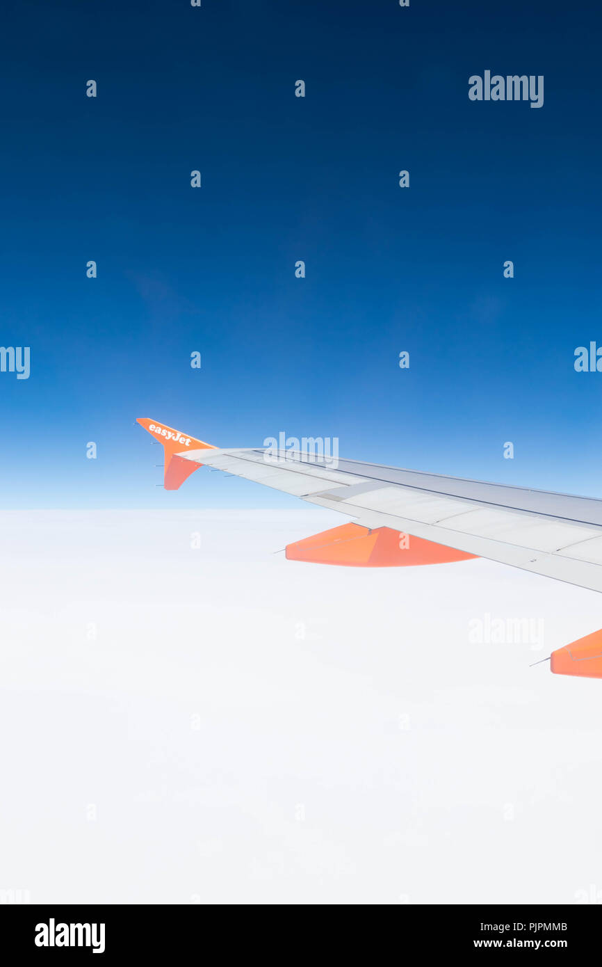 Easyjet flight above the clouds hi-res stock photography and images - Alamy