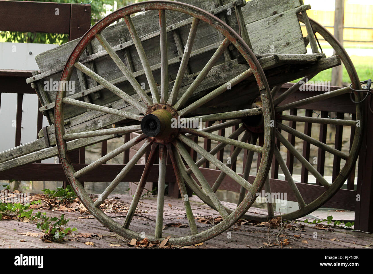 Old Wooden Wheelbarrow Stock Photos & Old Wooden Wheelbarrow Stock ...