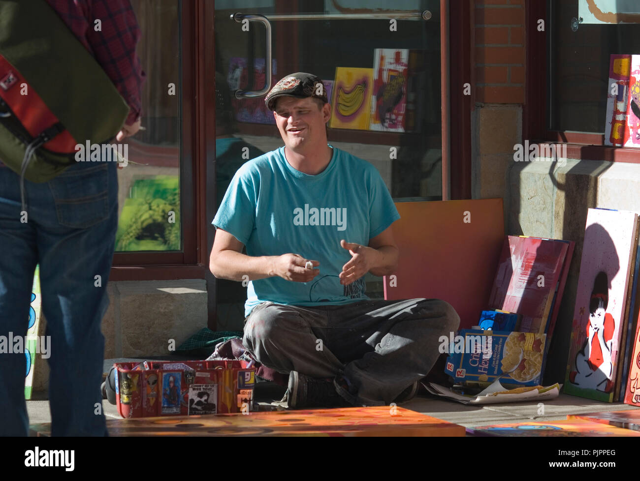 This artist was painting and selling his creations on Pearl St., just ...