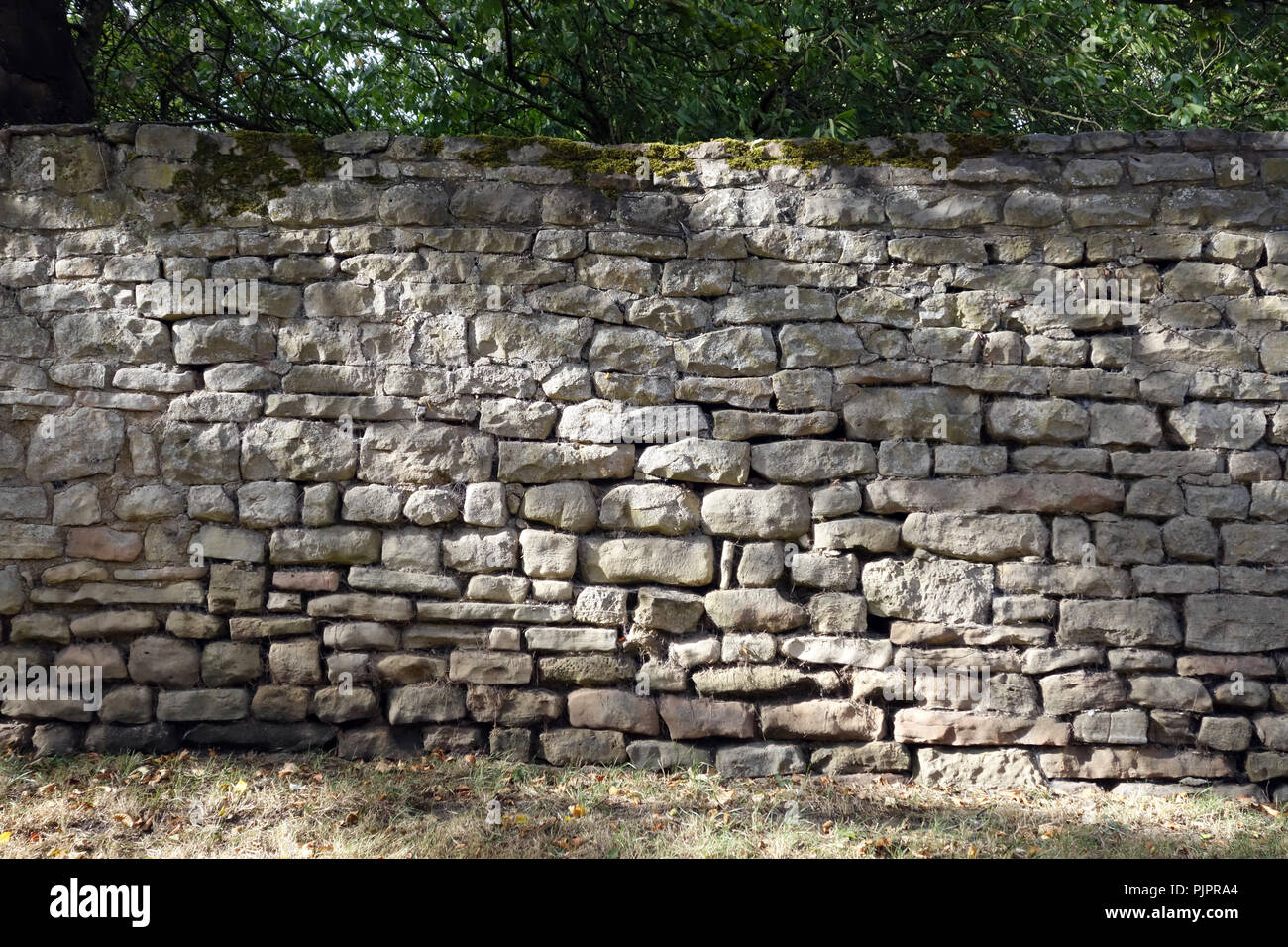 Big Dry Stone wall on private estate, layer in courses Stock Photo - Alamy