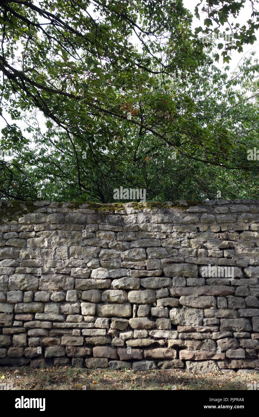 Big Dry Stone wall on private estate, layer in courses Stock Photo - Alamy