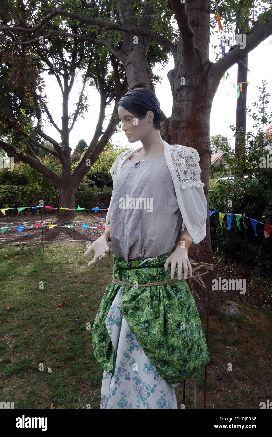Oddly dressed female mannequin in the garden of Firbeck Village Hall ...