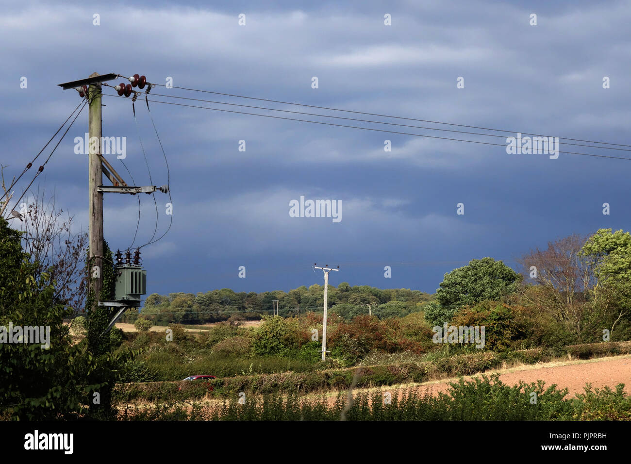 Power lines in rural village hi-res stock photography and images - Alamy