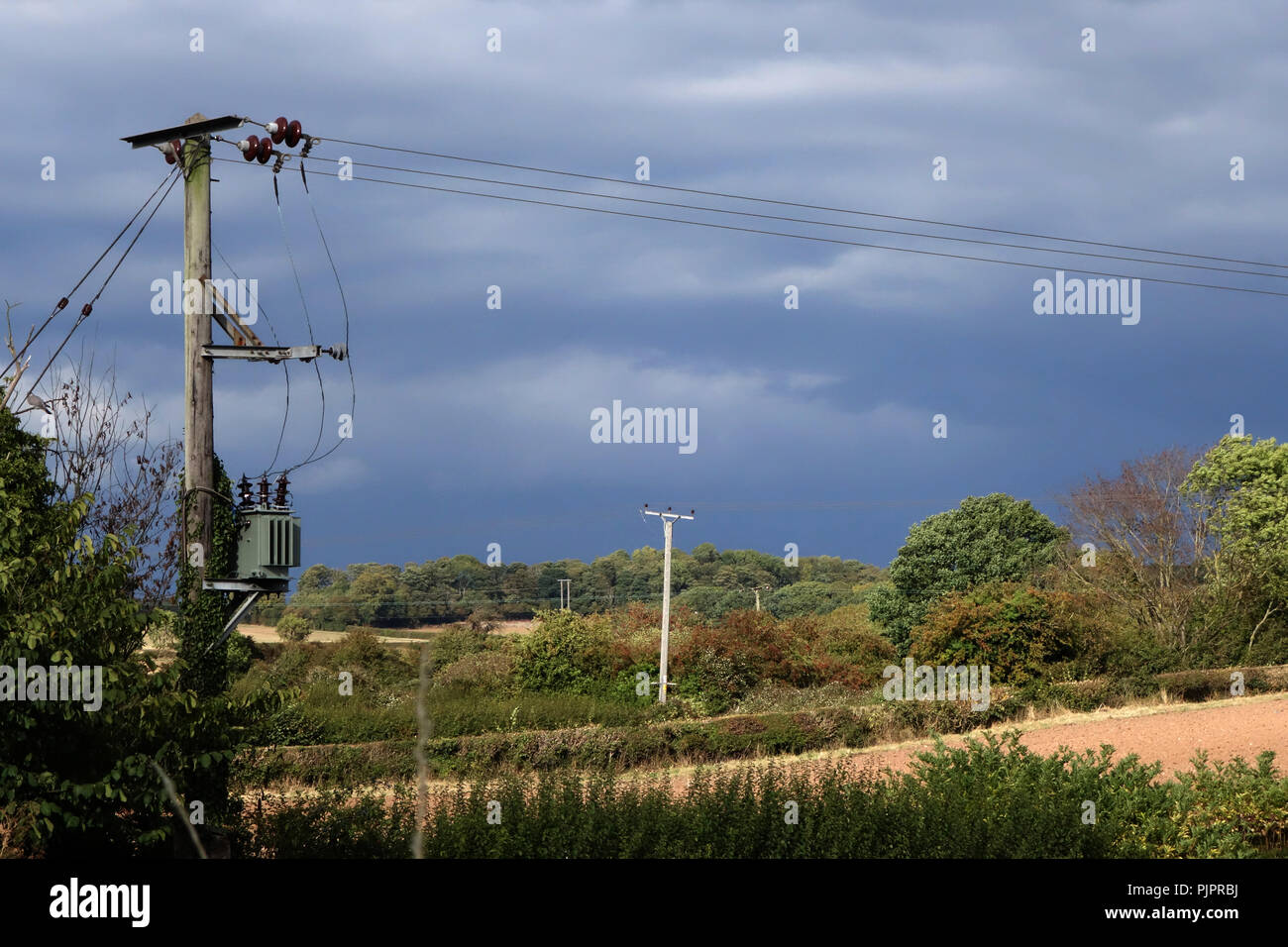 Power lines in rural village hi-res stock photography and images - Alamy