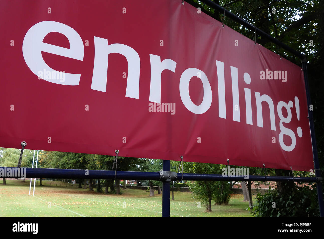 We're still enrolling sign at Thomas Rotherham College Stock Photo - Alamy
