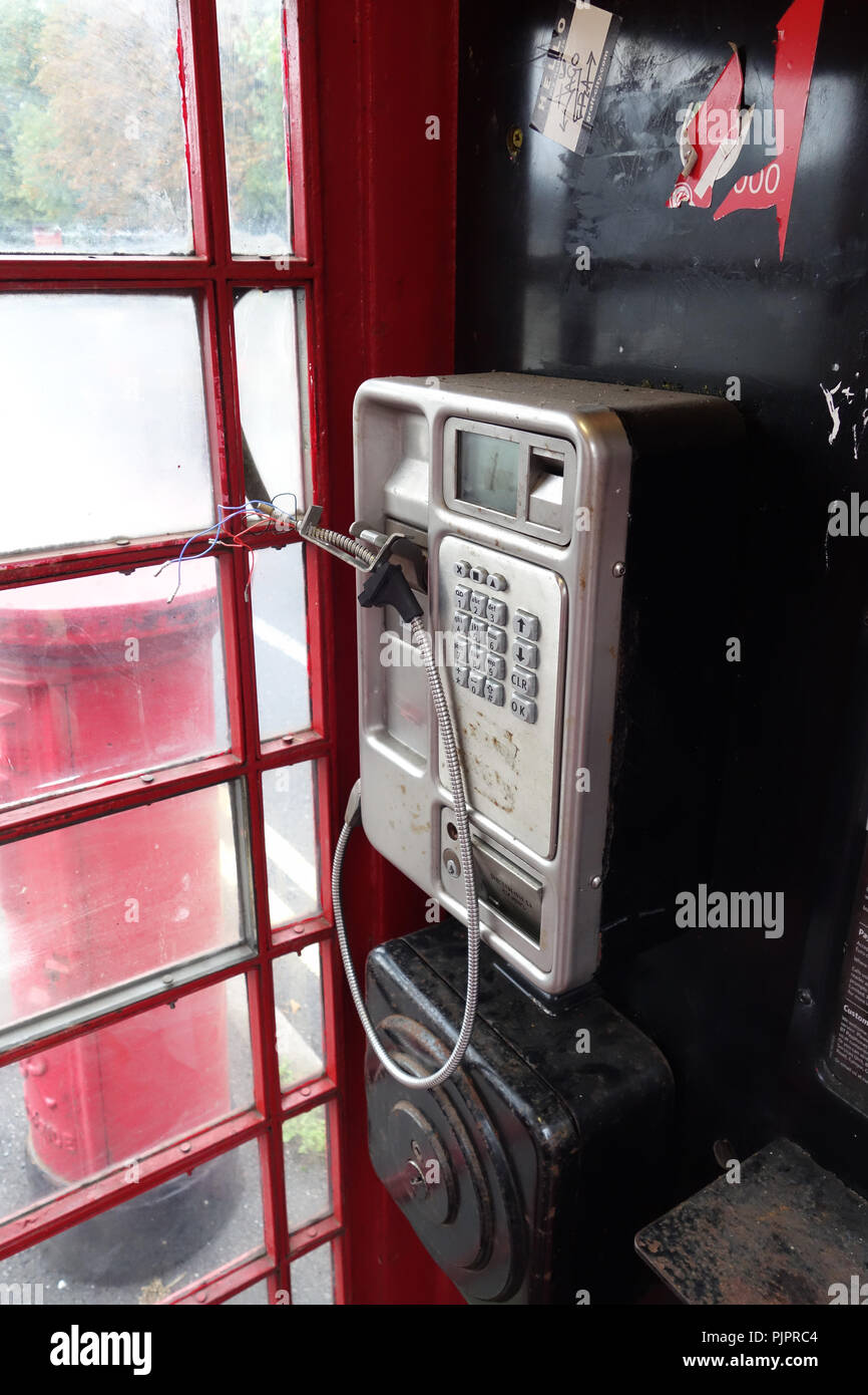 Handset missing in Vandalised phone box interior Stock Photo - Alamy