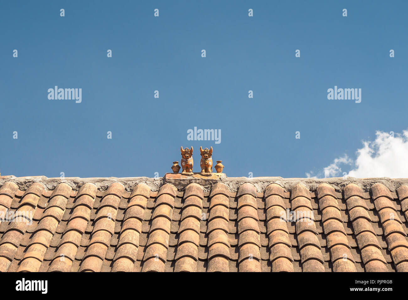 Torito de Pukara, pottery bull statues, is the traditional roof ...