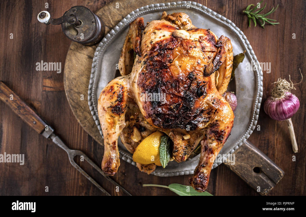 Grilled whole chicken above Stock Photo - Alamy