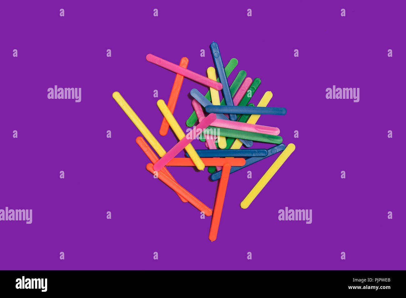 bunch of multicolored plastic counting sticks for children lying on a ...