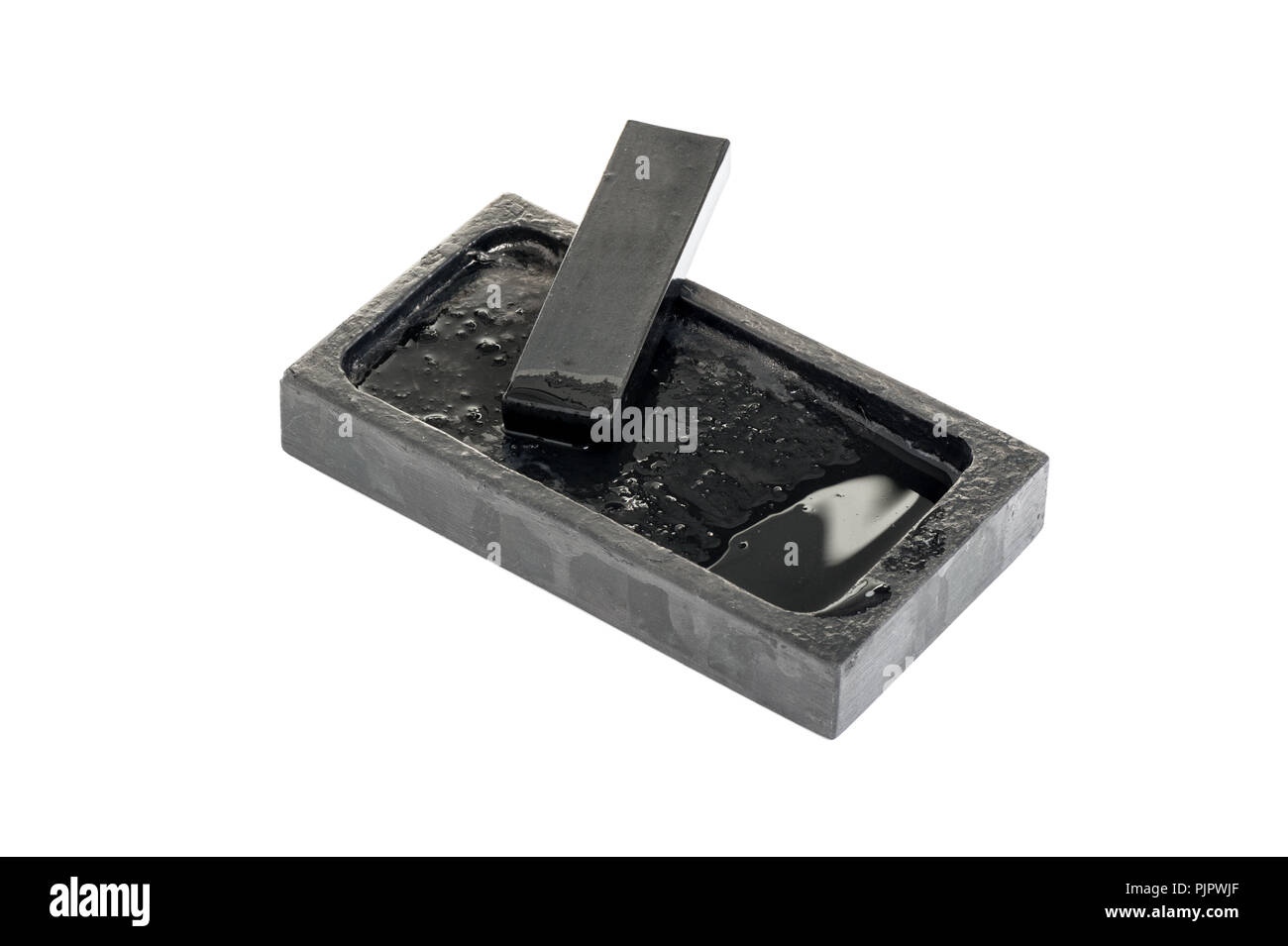 inkstone and inkstick isolated on white background, used with ...