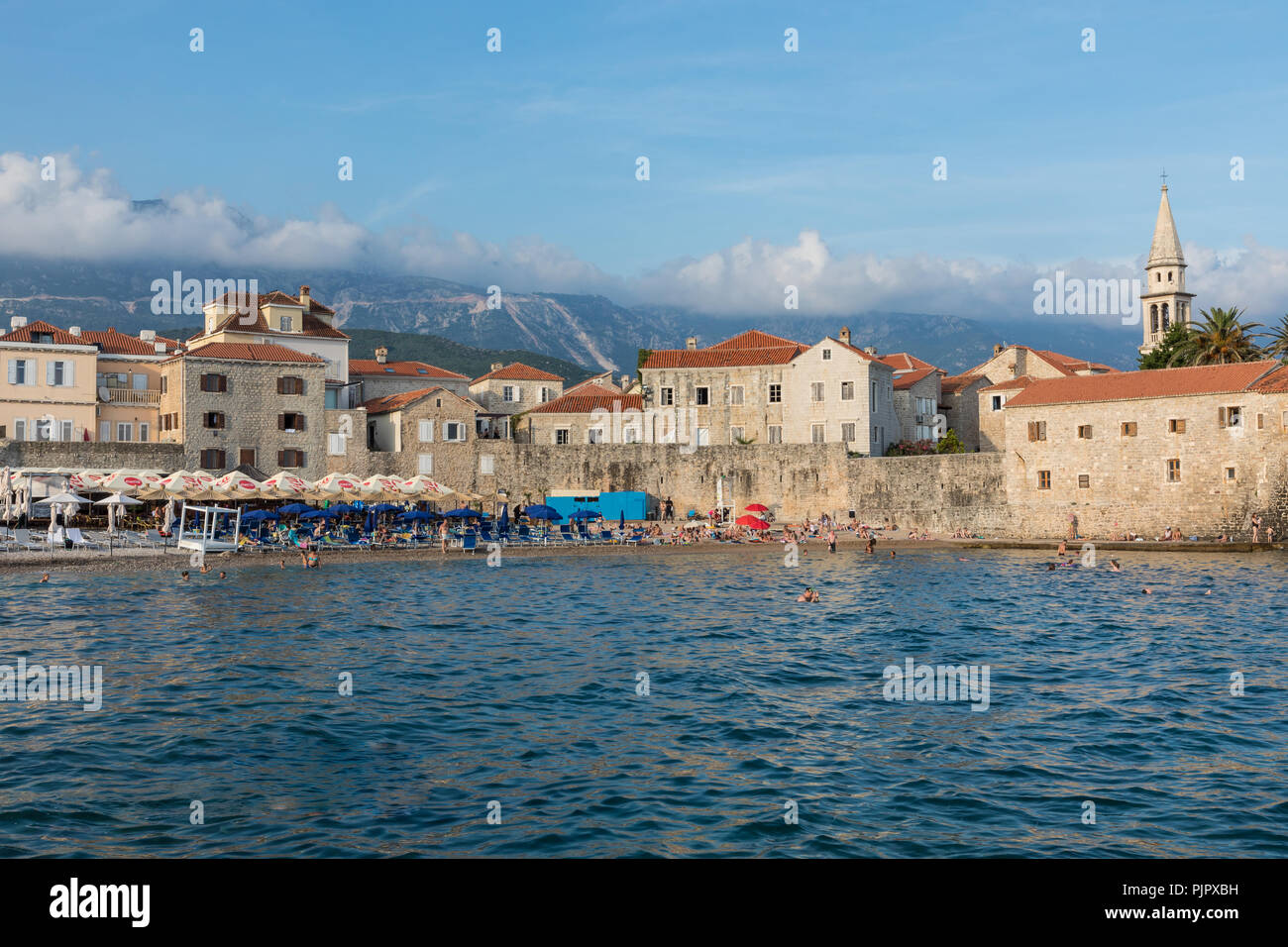 BUDVA, MONTENEGRO - JUNE 20, 2018: People are relaxing on the beach ...