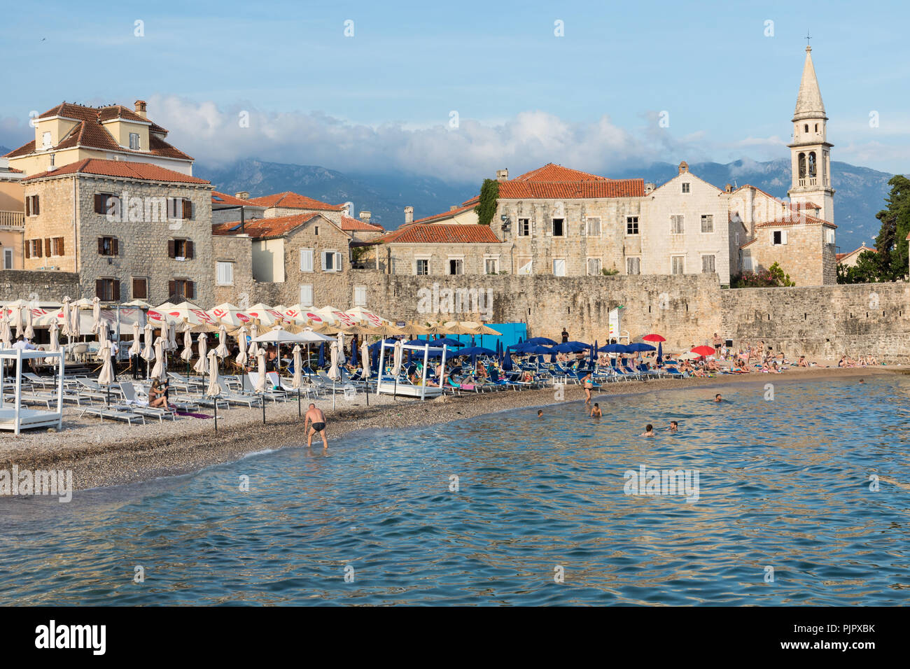 BUDVA, MONTENEGRO - JUNE 20, 2018: People are relaxing on the beach ...