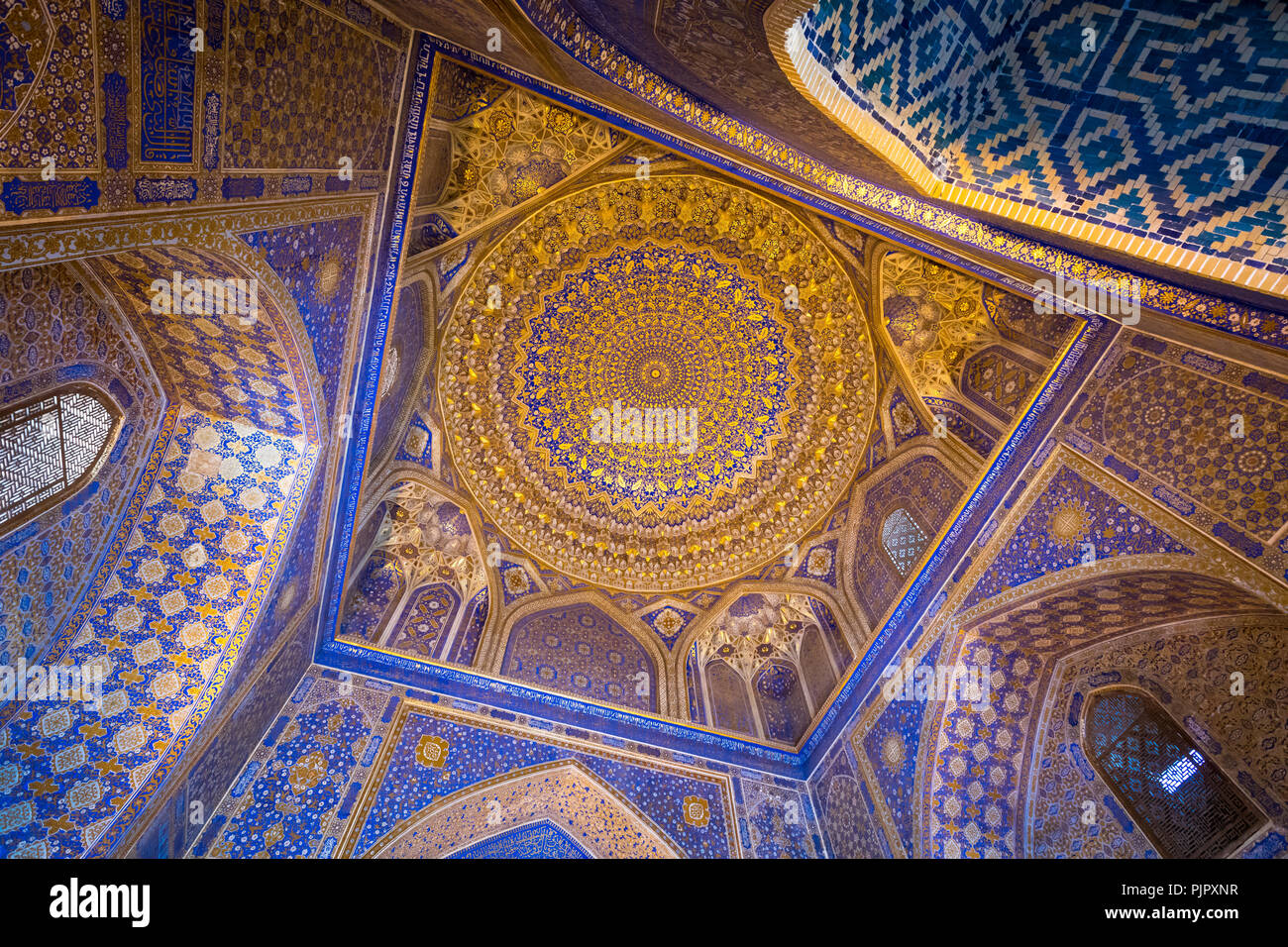 SAMARKAND, UZBEKISTAN - AUGUST 31, 2018: Interior of Tilya Kori Mosque ...