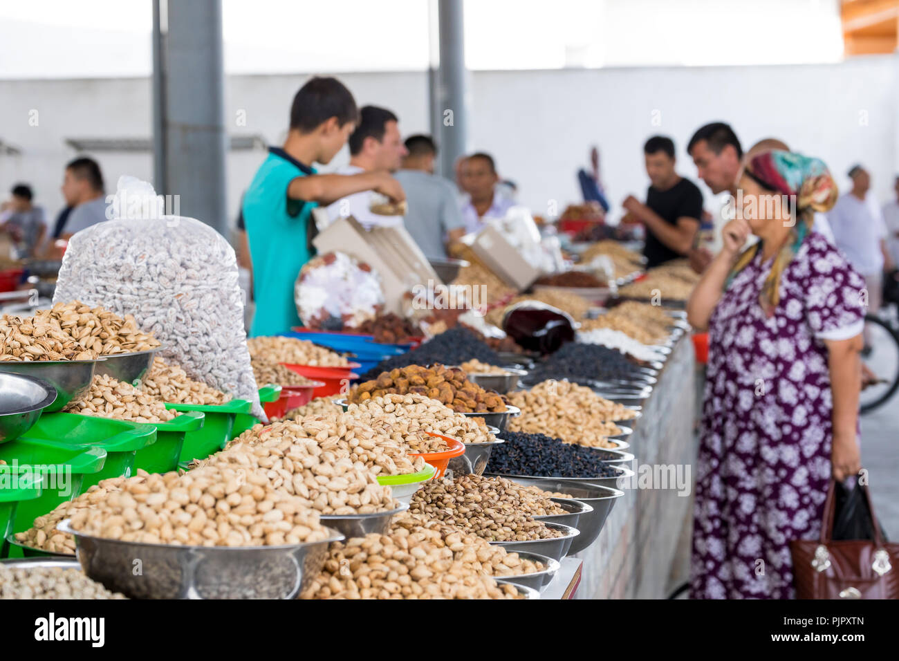 MARGILAN, UZBEKISTAN - AUGUST 24, 2018: People at local fruit and ...
