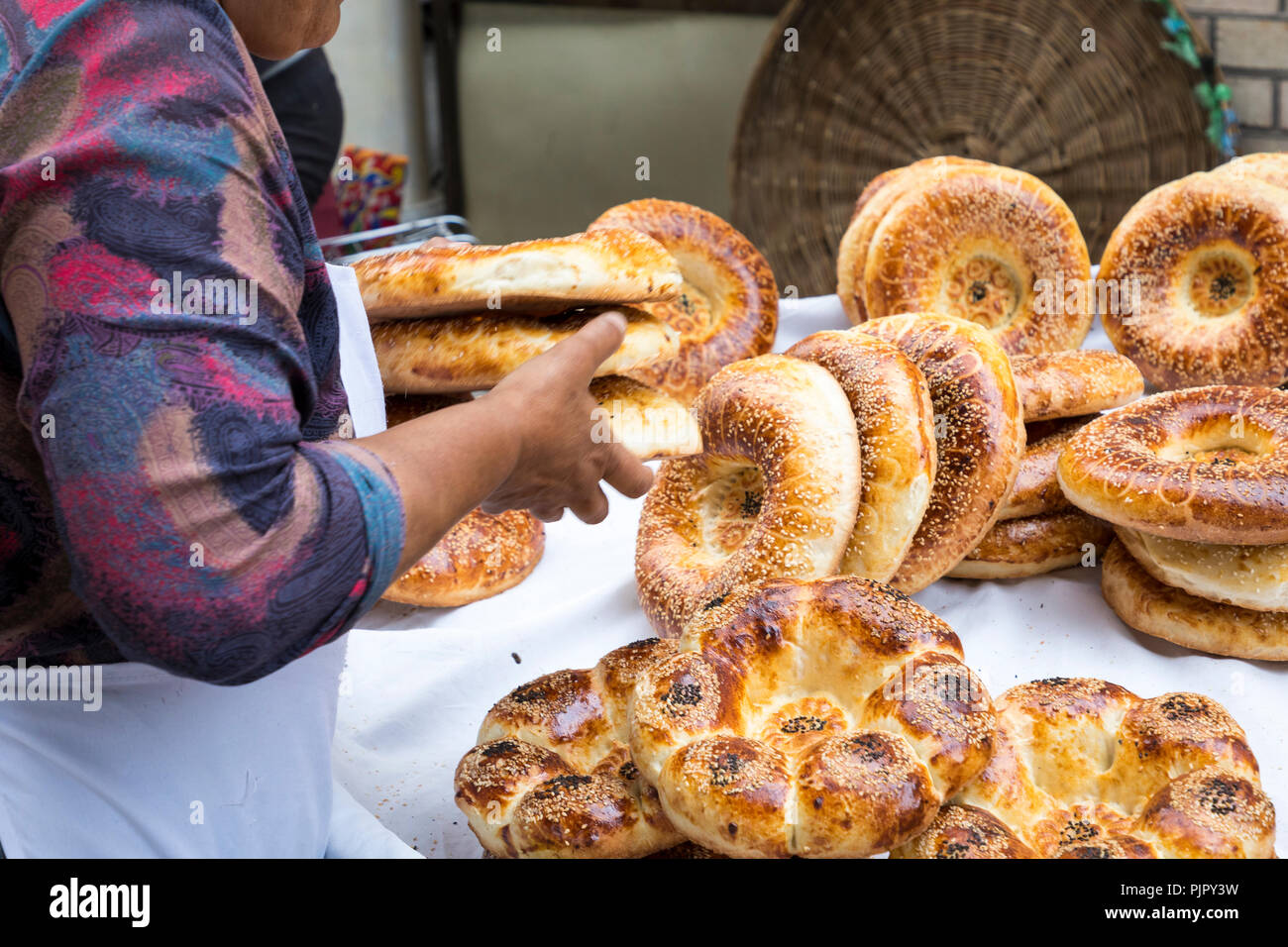Traditional uzbekistan bread lavash at local bazaar, is a soft flat ...