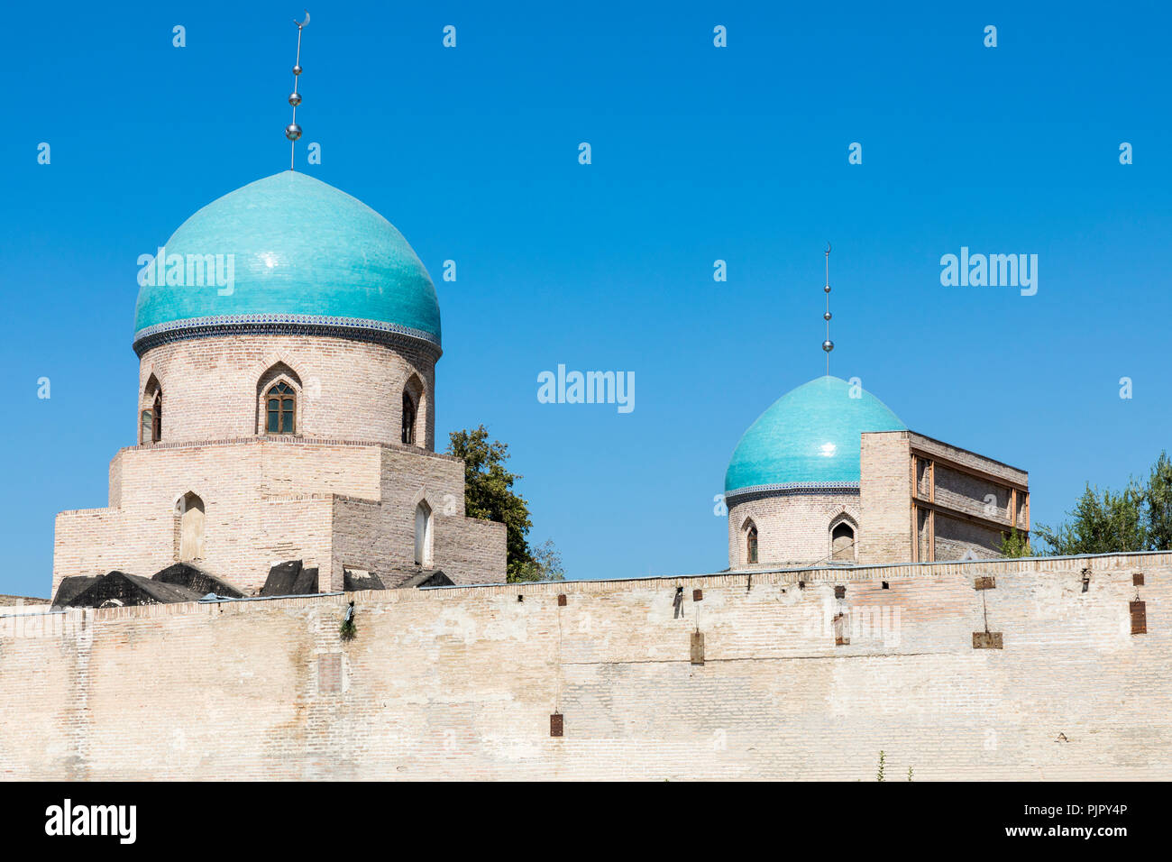 The facade of the Norbut-biy Madrasah in Kokand, Uzbekistan Stock Photo ...