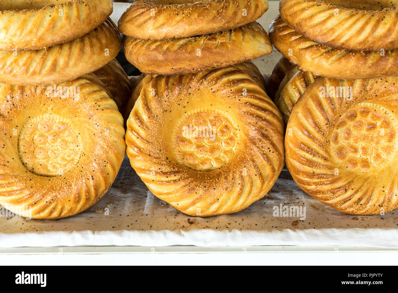 Traditional uzbekistan bread lavash at local bazaar, is a soft flat ...