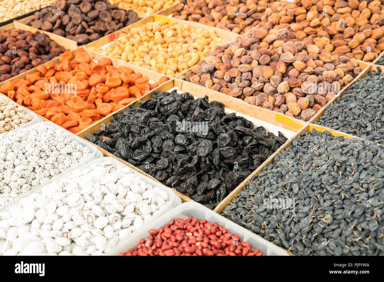 Dried fruits and nuts on local food market in Tashkent, Uzbekistan ...
