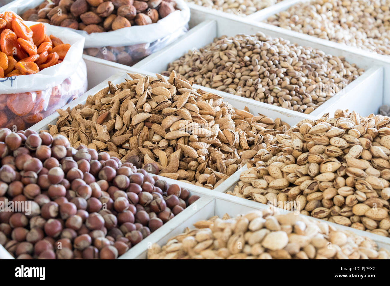 Dried fruits and nuts on local food market in Tashkent, Uzbekistan ...