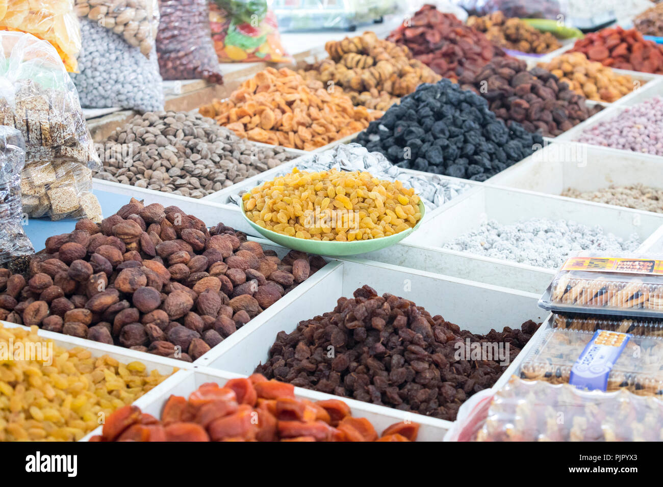 Dried fruits and nuts on local food market in Tashkent, Uzbekistan ...