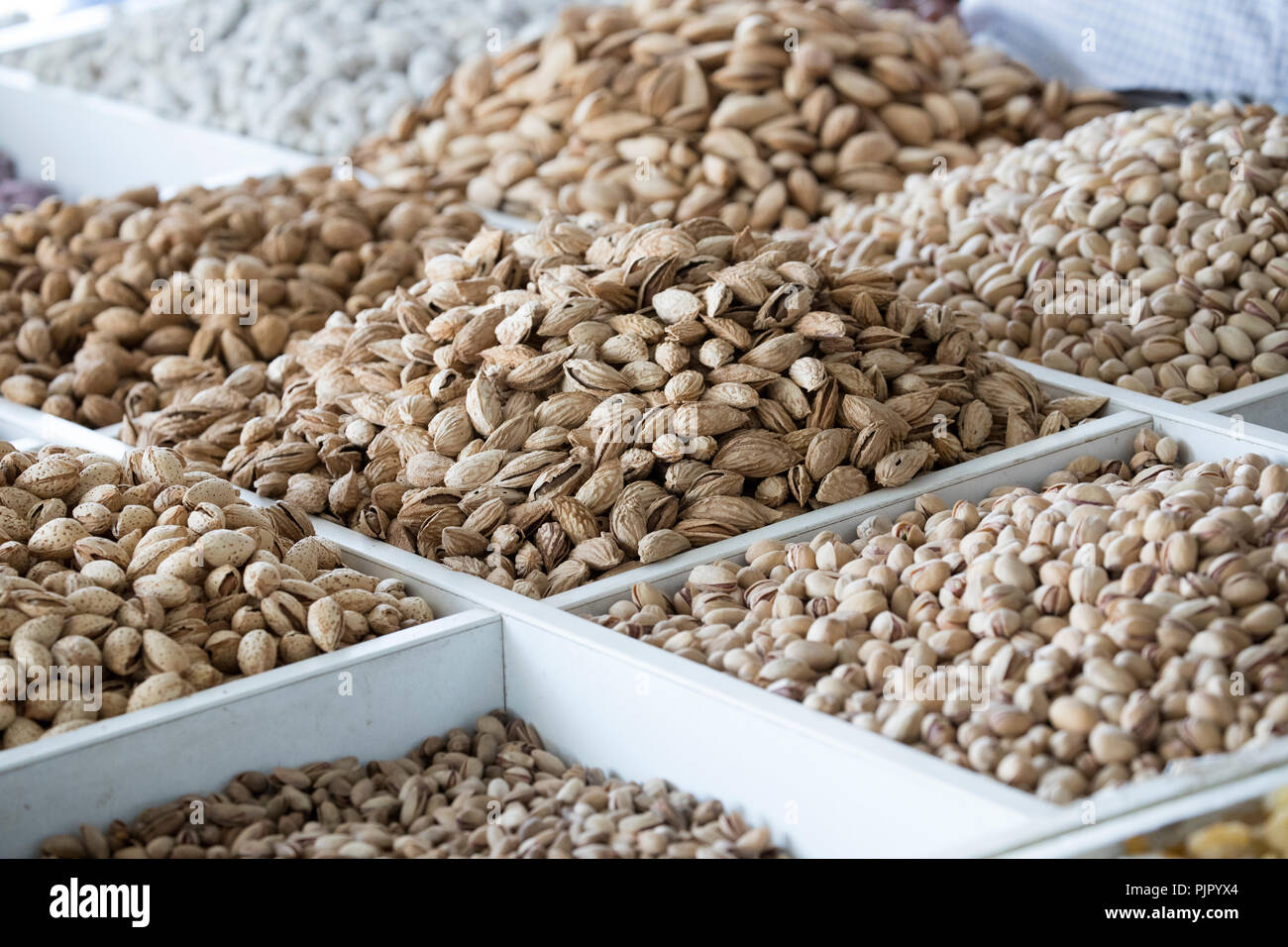 Dried fruits and nuts on local food market in Tashkent, Uzbekistan ...