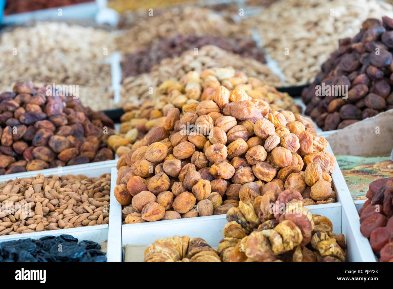 Dried fruits and nuts on local food market in Tashkent, Uzbekistan ...