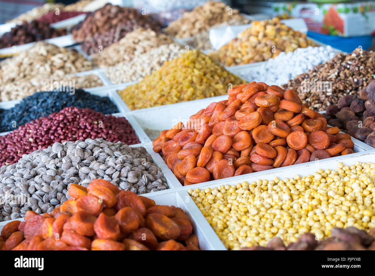 Dried fruits and nuts on local food market in Tashkent, Uzbekistan ...