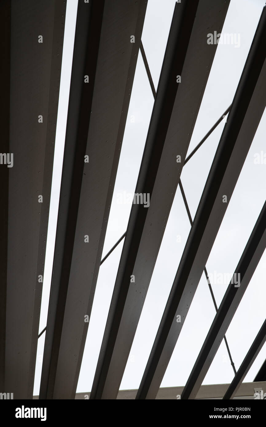 Black struts with gaps from top to bottom Stock Photo - Alamy