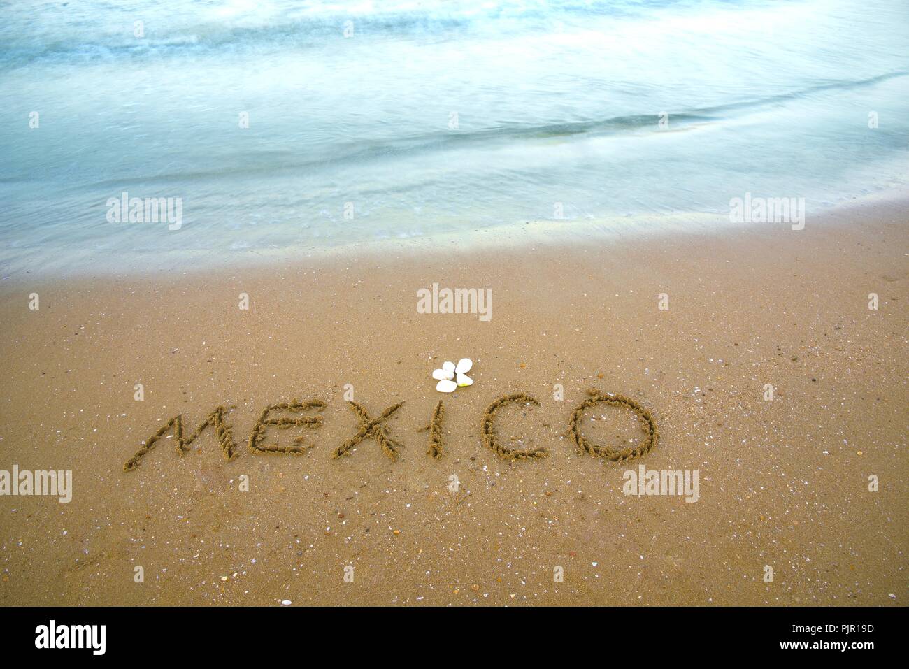 Mexico written on the sand on the beach Stock Photo - Alamy