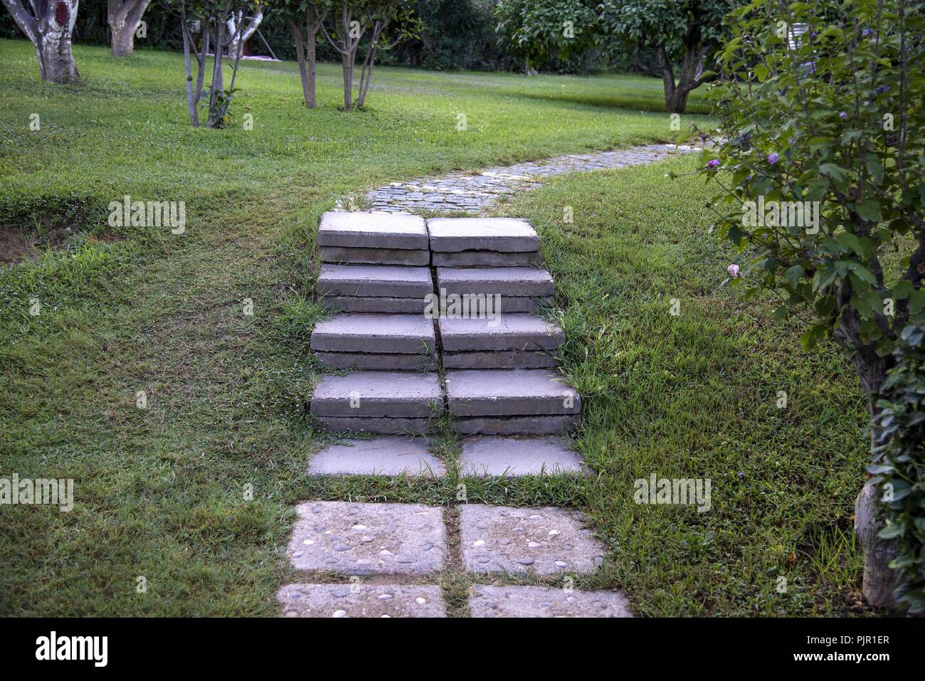 Stone and wooden outdoor stairs in the park Stock Photo - Alamy
