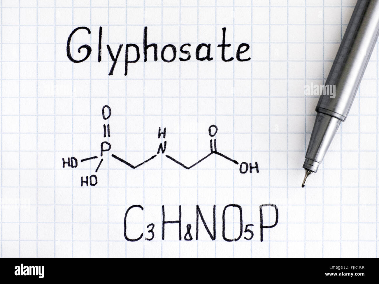 Chemical formula of Glyphosate with pen. Close-up Stock Photo - Alamy