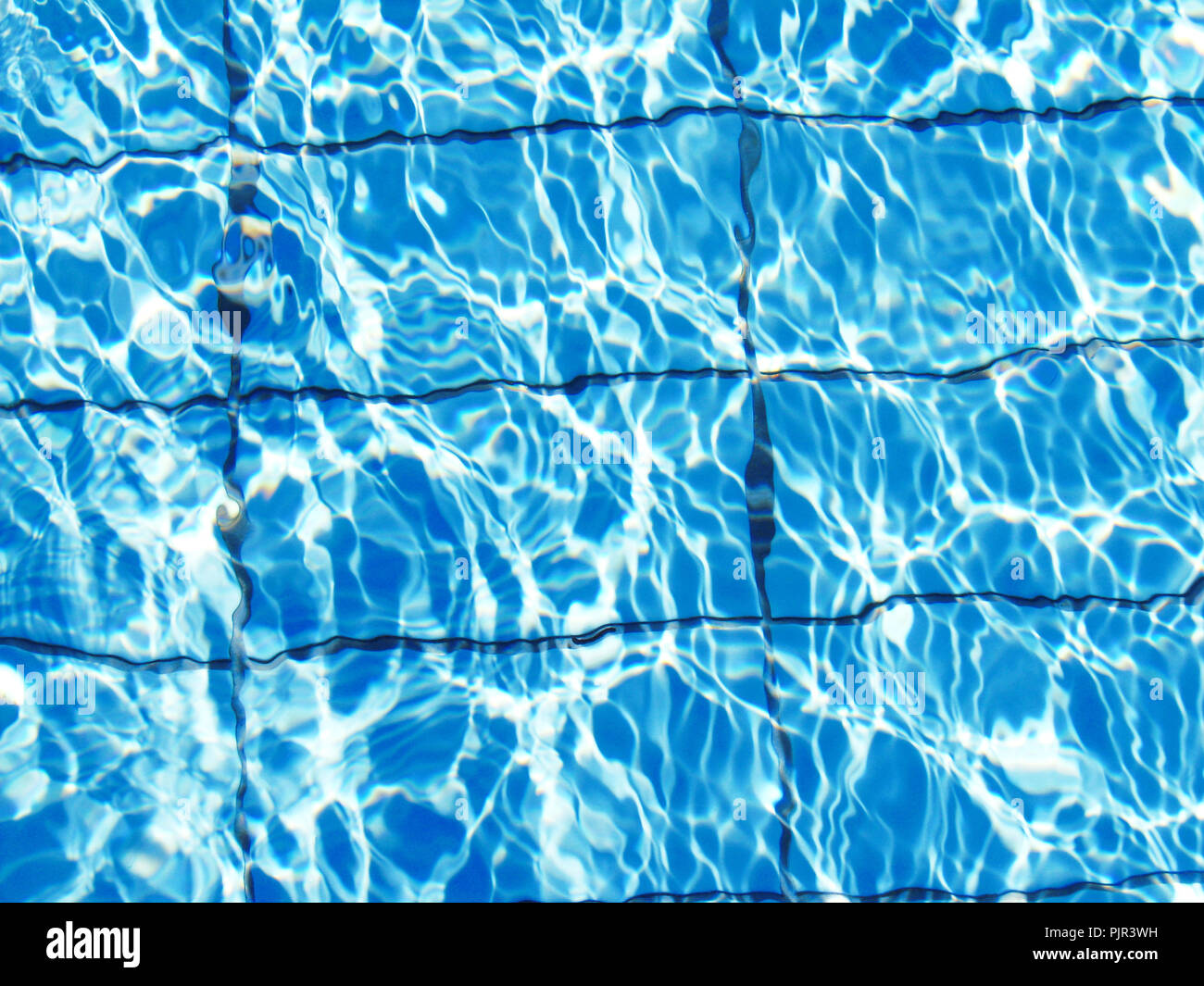 background of bright blue clear water in the pool Stock Photo - Alamy