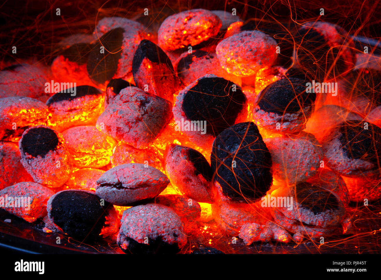 Glowing coal inside of a barbecue grill Stock Photo - Alamy