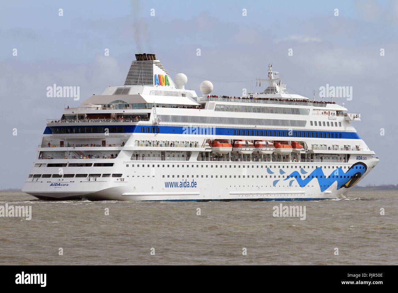 The cruise ship AIDAcara passes on 3 April 2015 Cuxhaven and continues ...