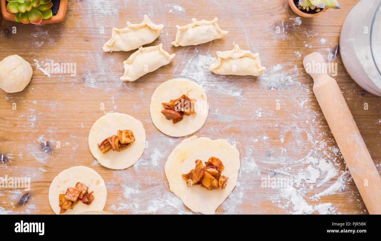 Step by step. Making home made empanadas with sweet filling Stock Photo ...