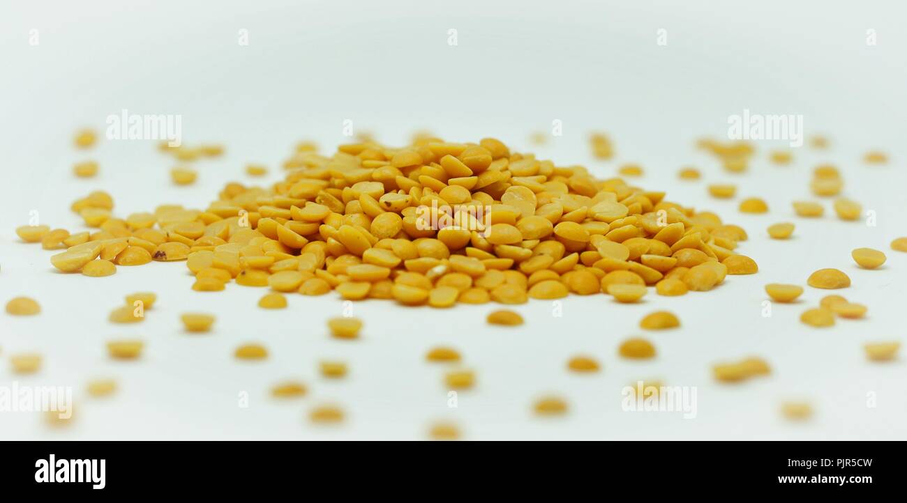 Legume - uncooked lentil or mung daal, in closeup view Stock Photo - Alamy