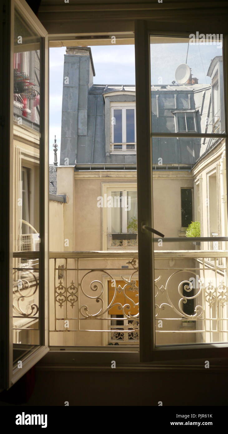 A typical french bedroom window in Paris, France Stock Photo - Alamy
