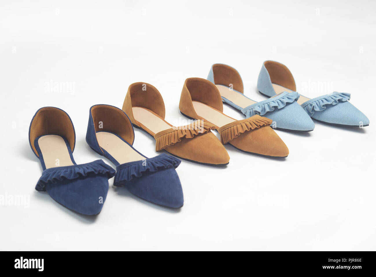 Girl shoes on white background Stock Photo - Alamy