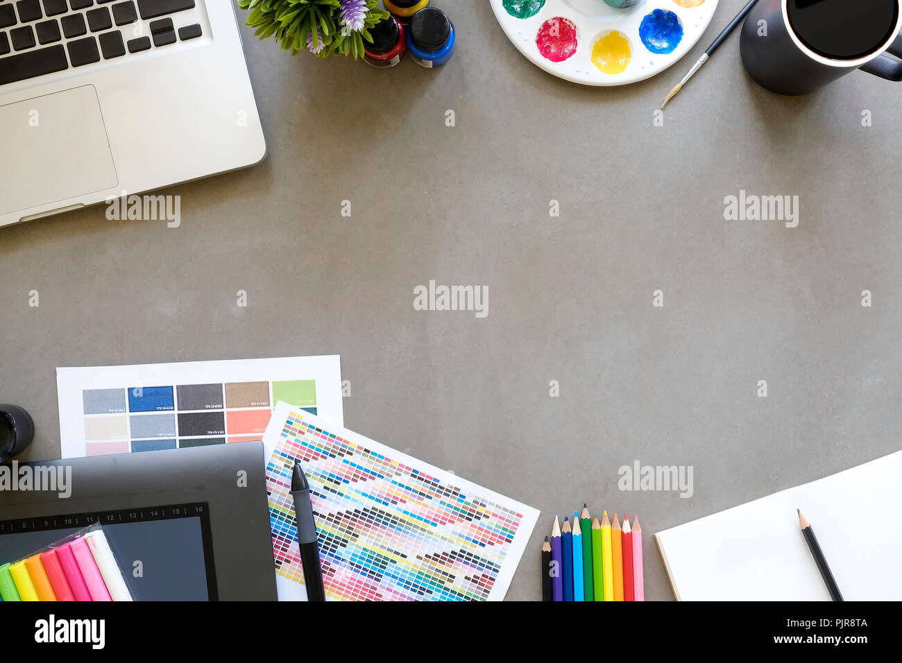 Artist workspace top view a graphic design table with laptop computer ...